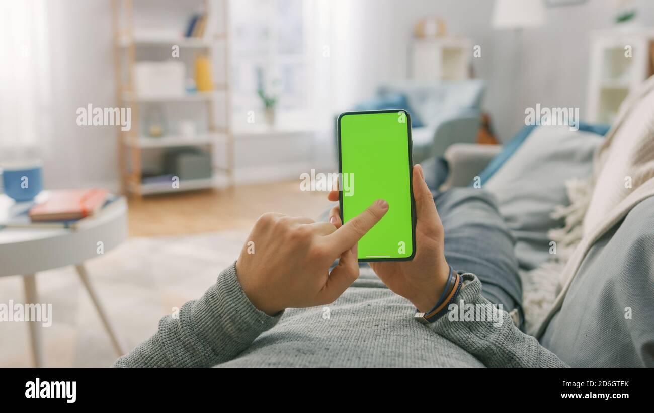 Man doing scrolling gesture on hi-res stock photography and images - Alamy