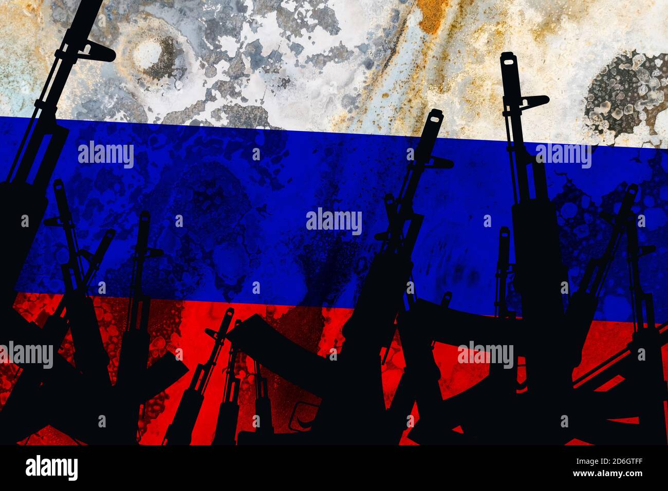 Several automatic rifles raised up on the background of the Russian ...