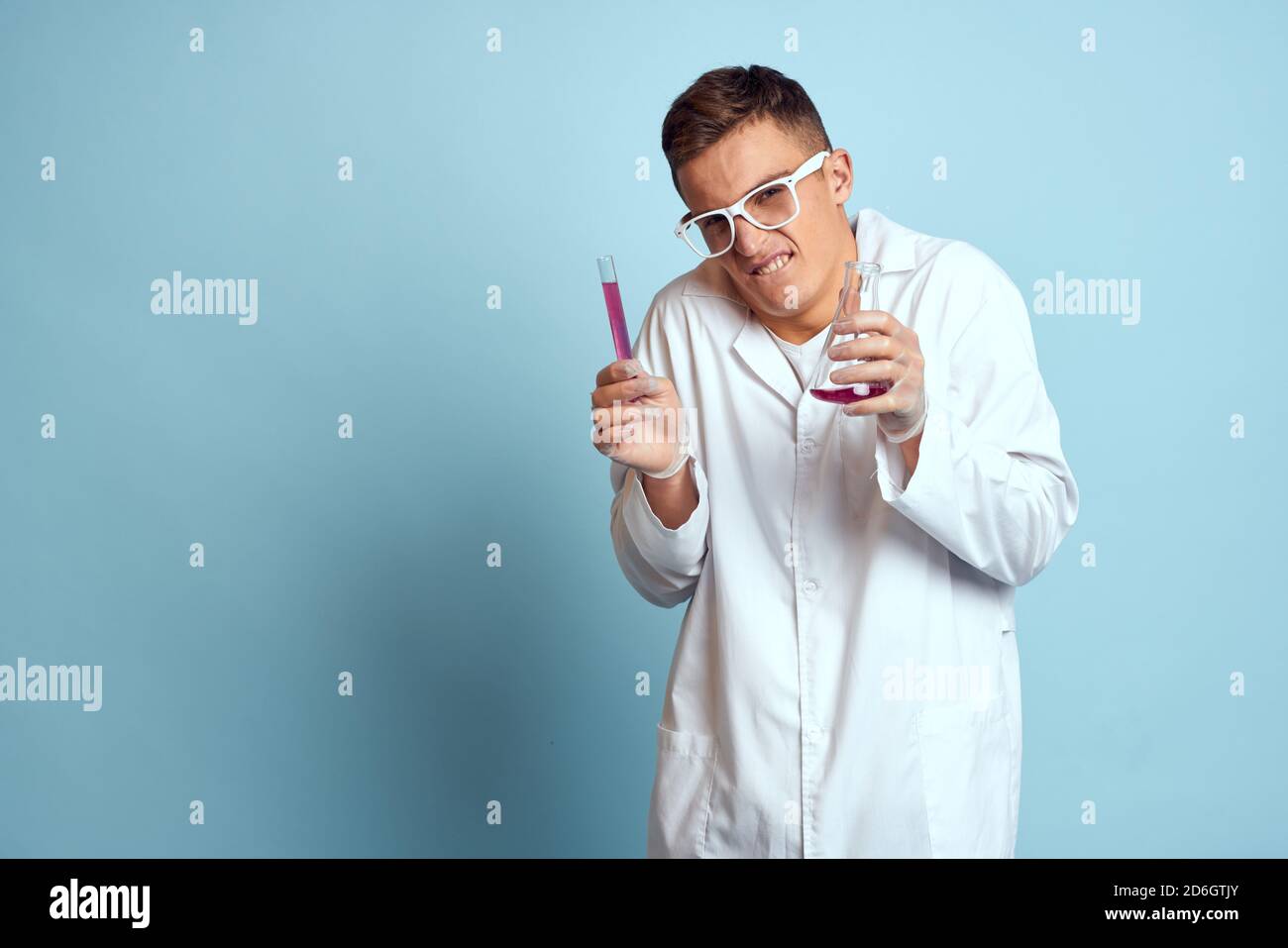 man holding flasks colorful liquid chemical laboratory model wearing ...