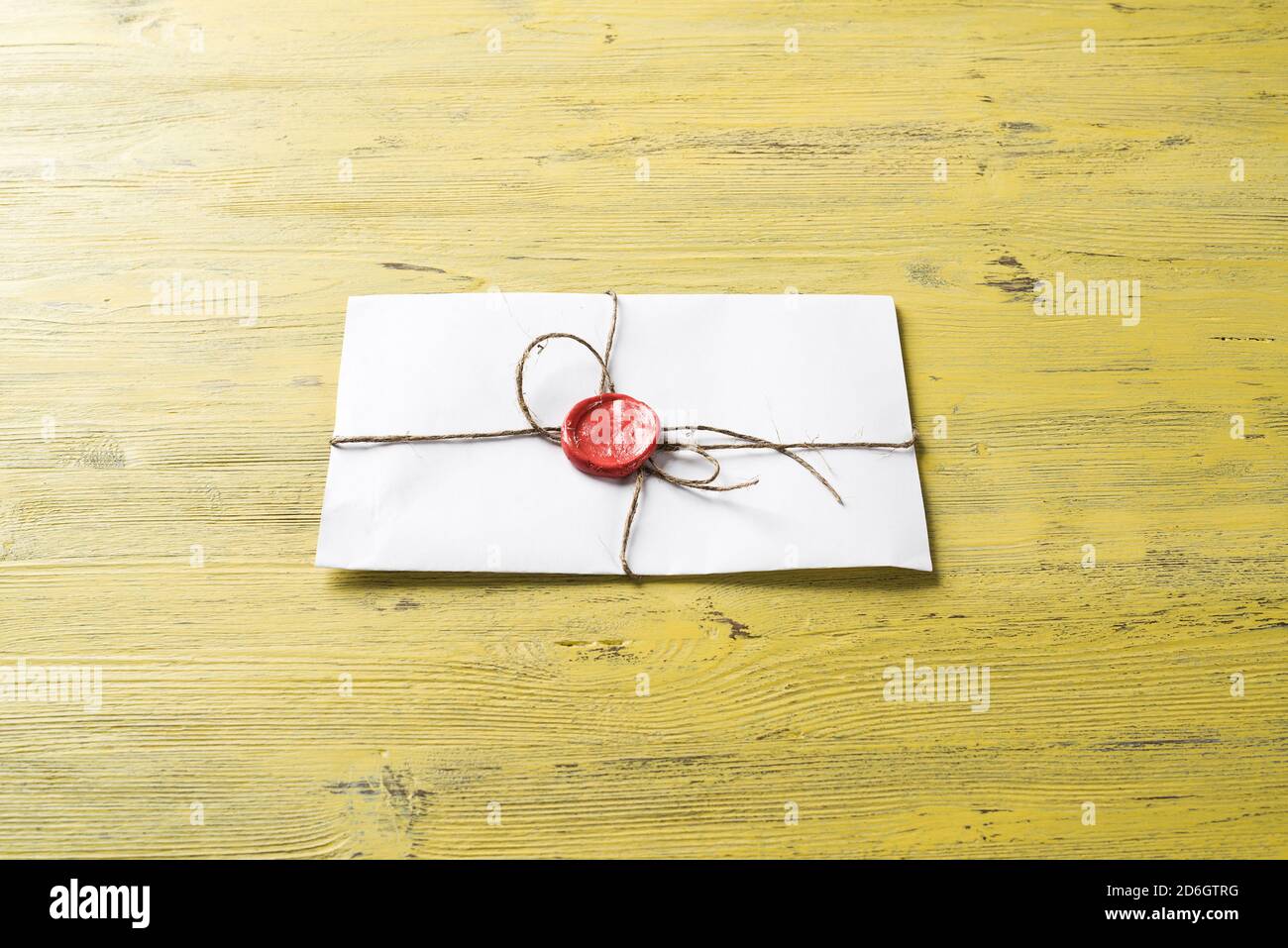 Letter with seal on table Stock Photo - Alamy