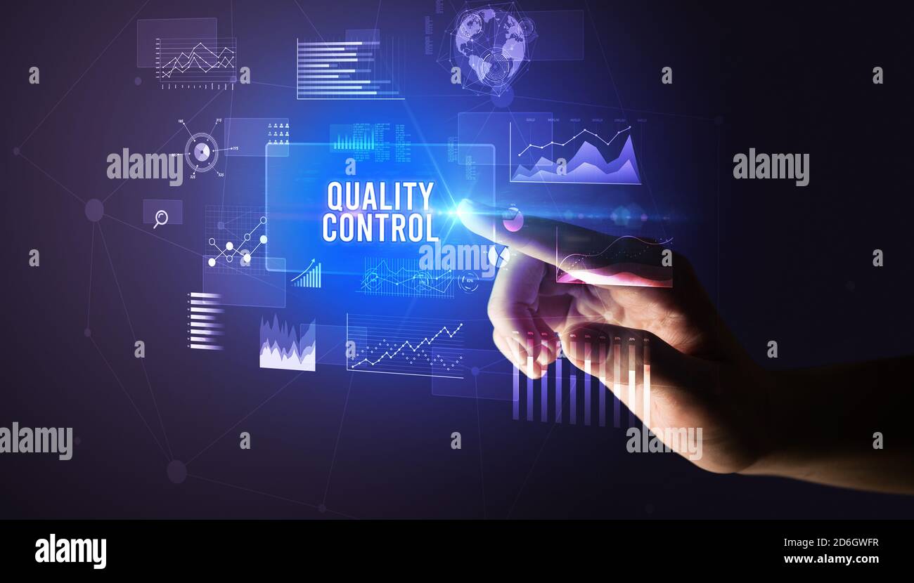 Hand touching QUALITY CONTROL inscription, new business technology ...