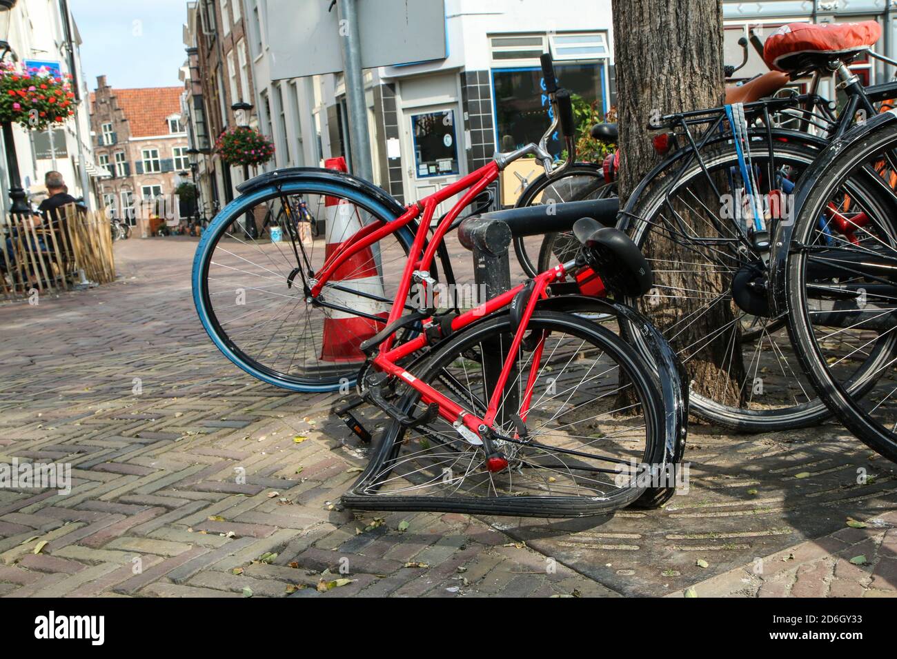 The detail of the bicycle wreck lying on the street in Utrecht in ...
