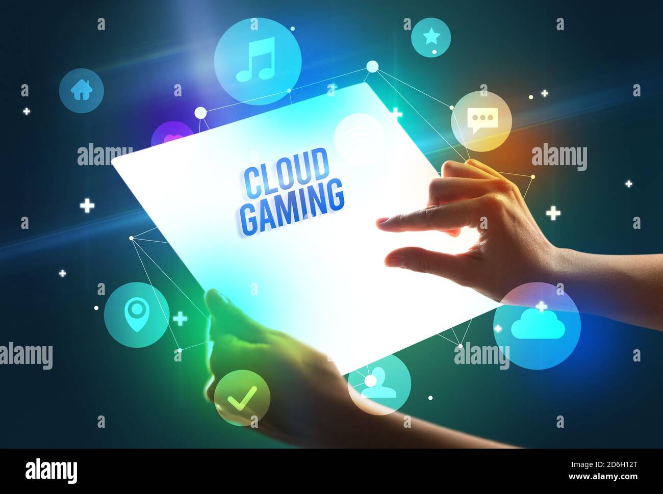 Holding futuristic tablet with CLOUD GAMING inscription, new technology ...