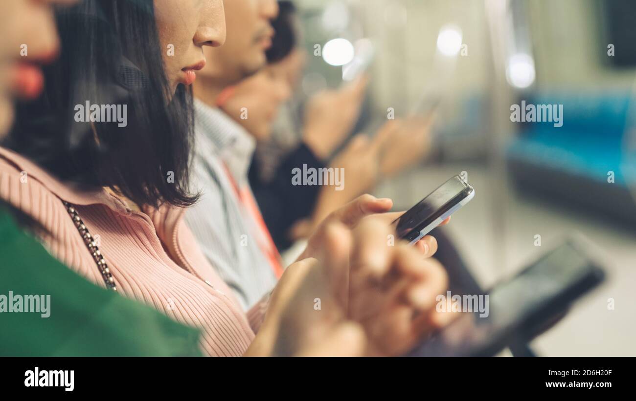 Sitting crowd watching technology communication hi-res stock ...