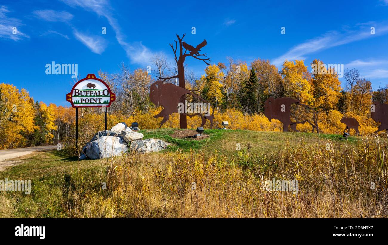 The entrance sign with fall foliage color at Buffalo Point, Manitoba ...