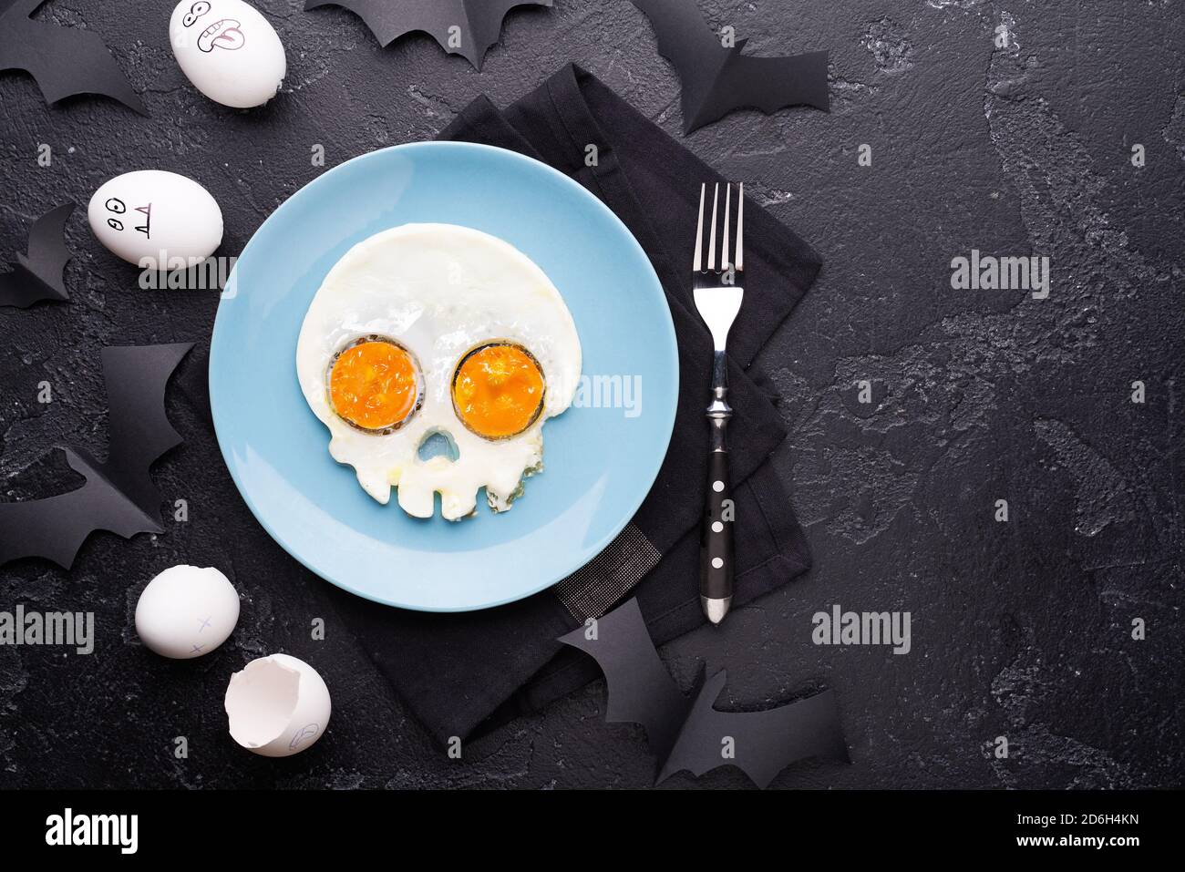 Fried eggs in the shape of a skull. Halloween breakfast Stock Photo - Alamy