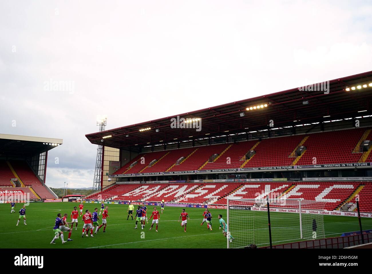 General view of the action on the pitch in front of empty stands as ...