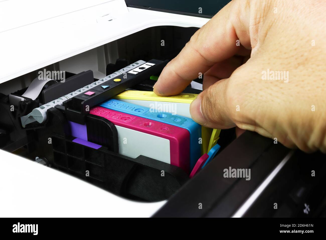 Technicians are install setup the ink cartridge of a inkjet printer the ...