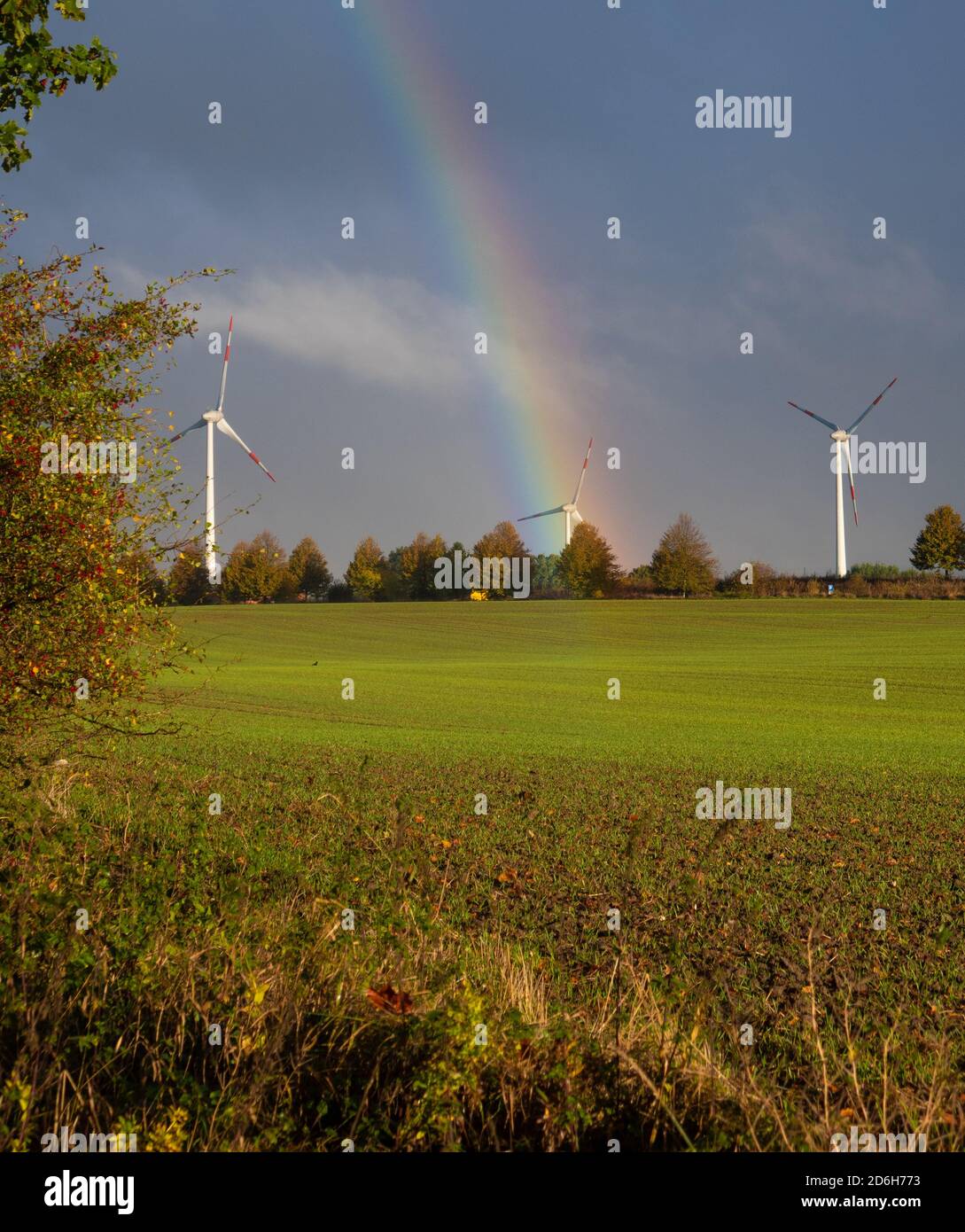 Rainbow over wind turbines hi-res stock photography and images - Alamy