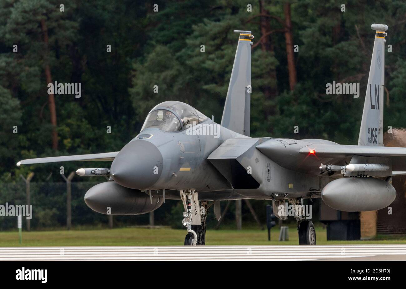 F-15C Eagle aircraft manouvre into position before flight at RAF ...