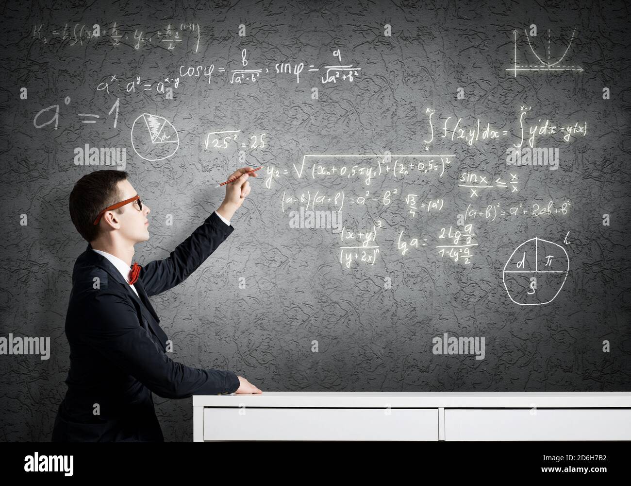 Student drawing science formulas Stock Photo - Alamy