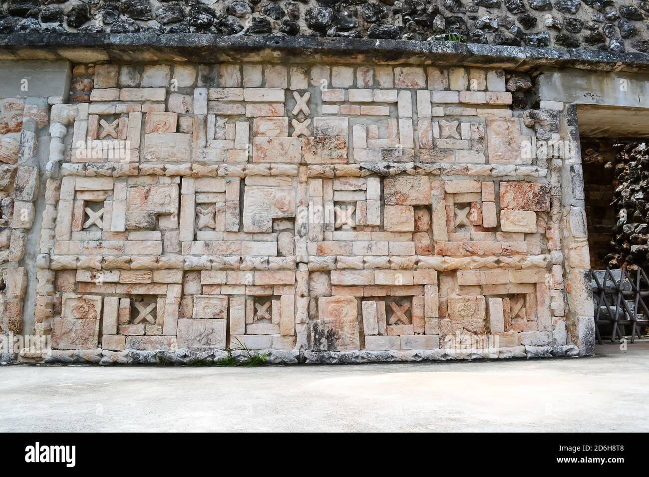 Mayan pyramids and various stone sculptures at the Chicen Itza ...