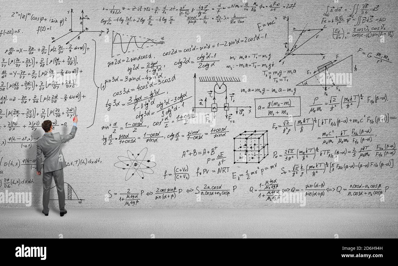 Man draw science formulas Stock Photo - Alamy