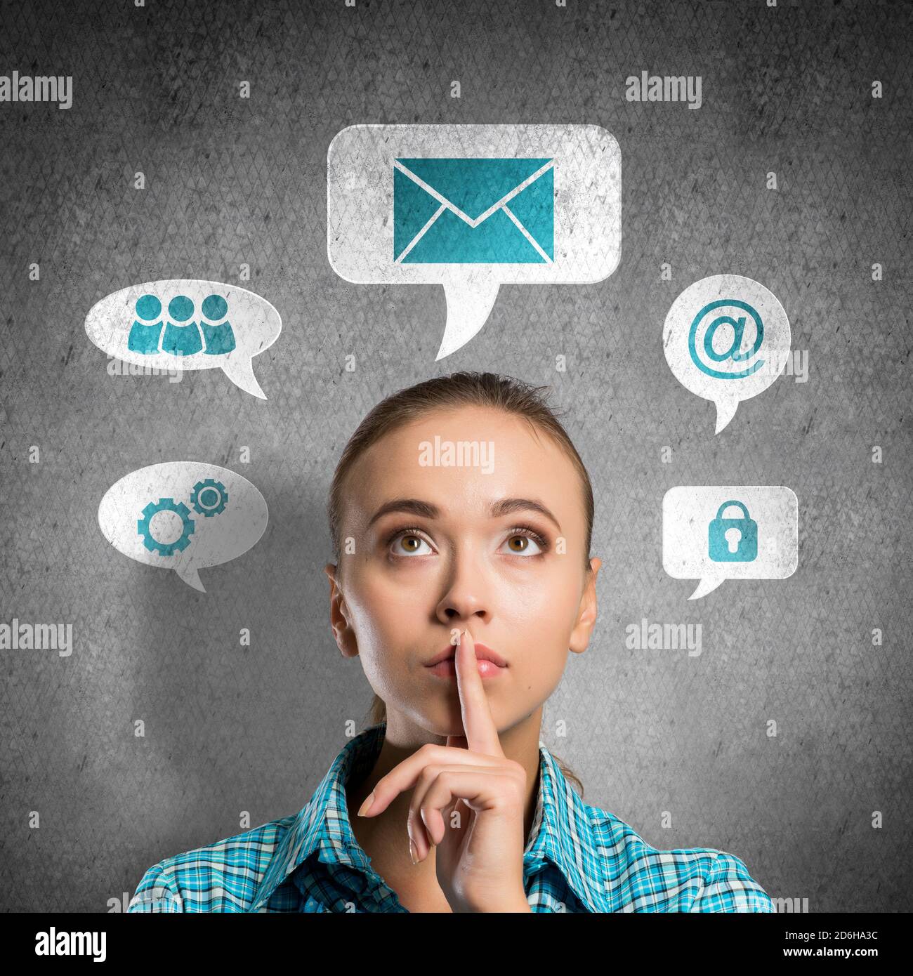 Girl showing hush gesture Stock Photo - Alamy