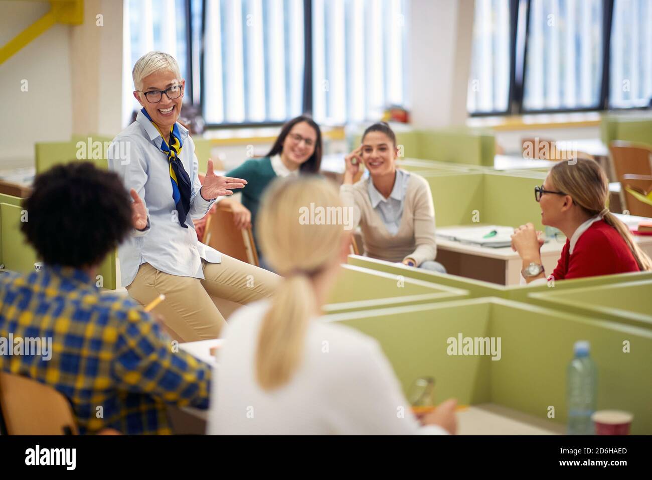 Female professor enjoying the lecture in a classroom Stock Photo - Alamy