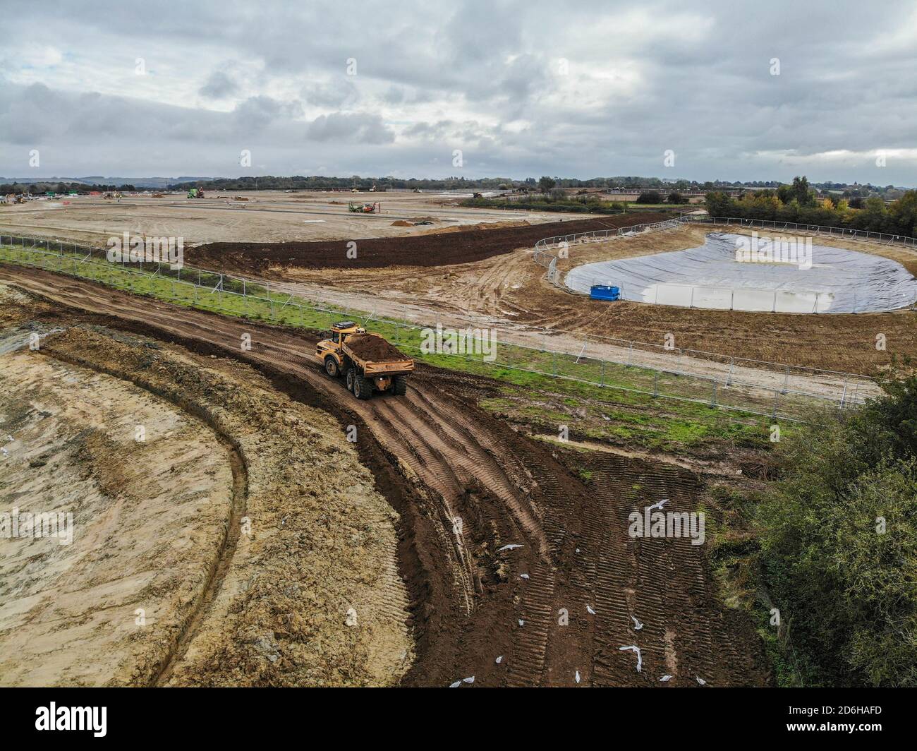 Truck dumps soil on the construction site of the Sevington Inland ...