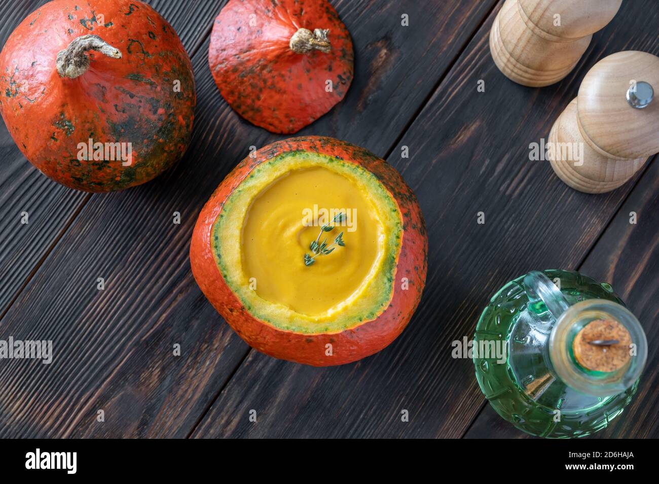 Pumpkin soup served in the hollowed out hokkaido pumpkin Stock Photo ...