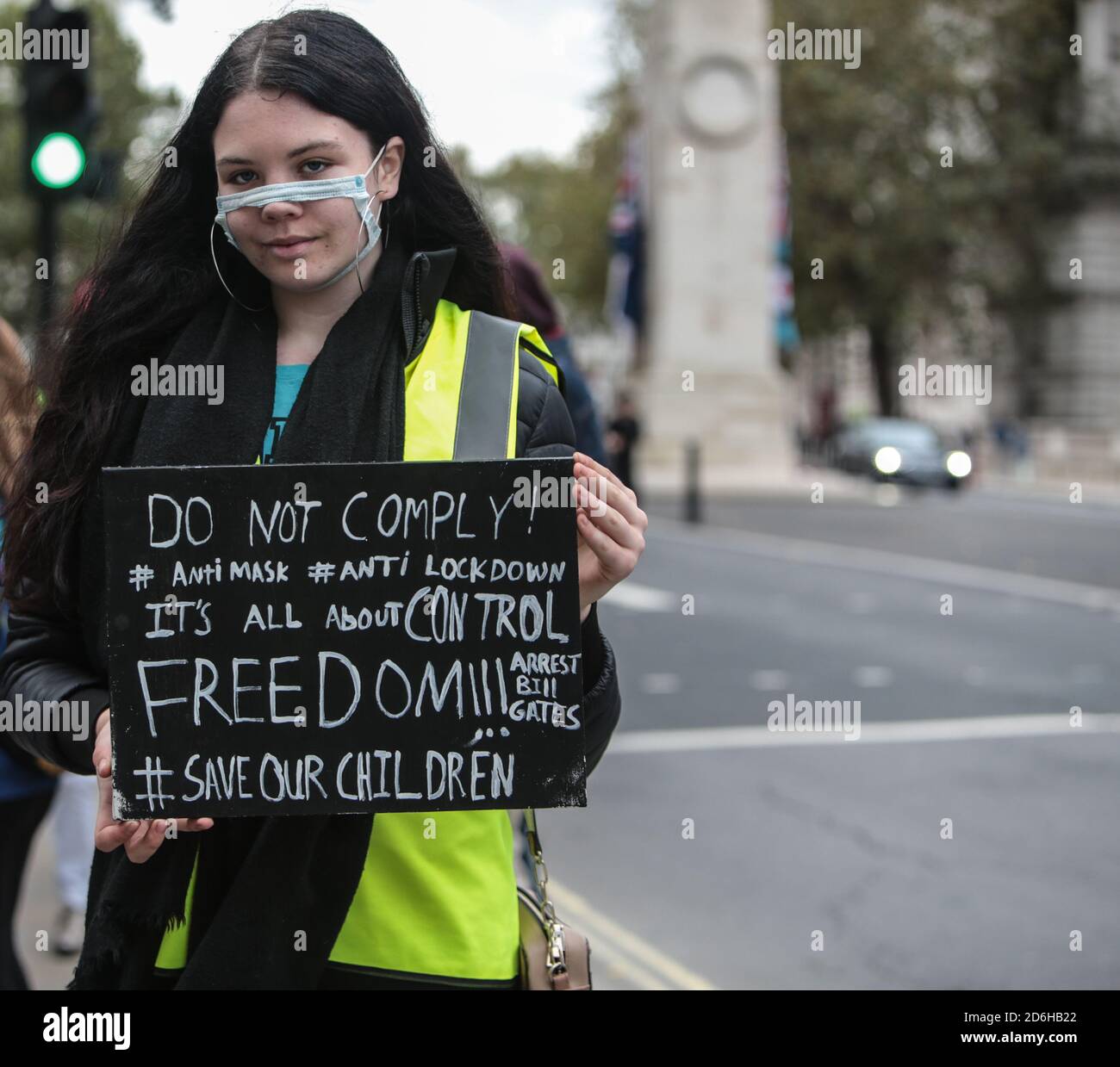 Woman wearing a ripped face mask hi-res stock photography and images ...