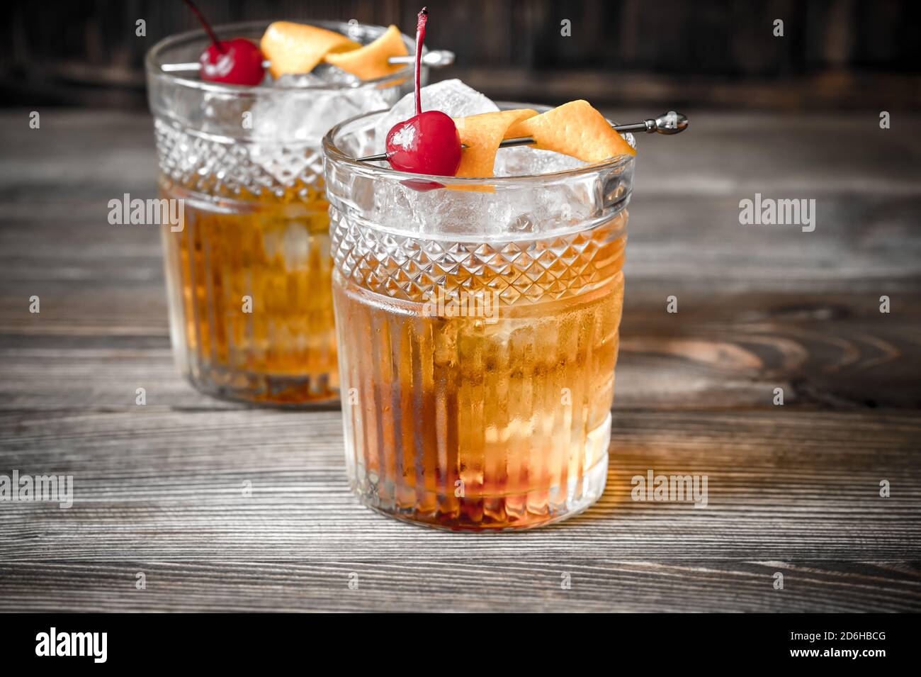 Two glasses of old fashioned cocktail Stock Photo - Alamy