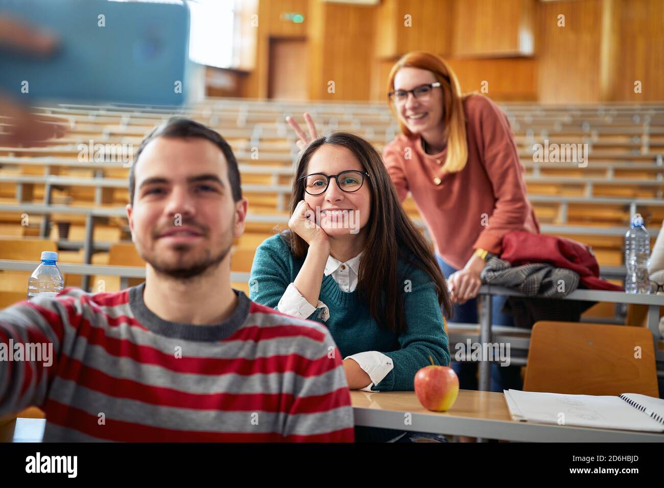 Group of students having fun at the lecture in the university ...