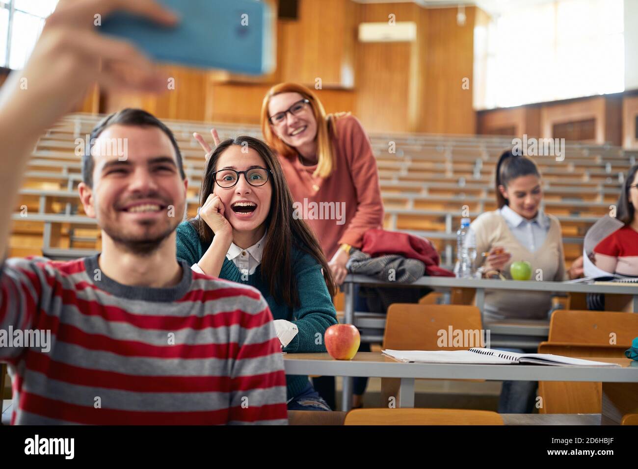 Group of students taking selfie at the lecture break in the university ...