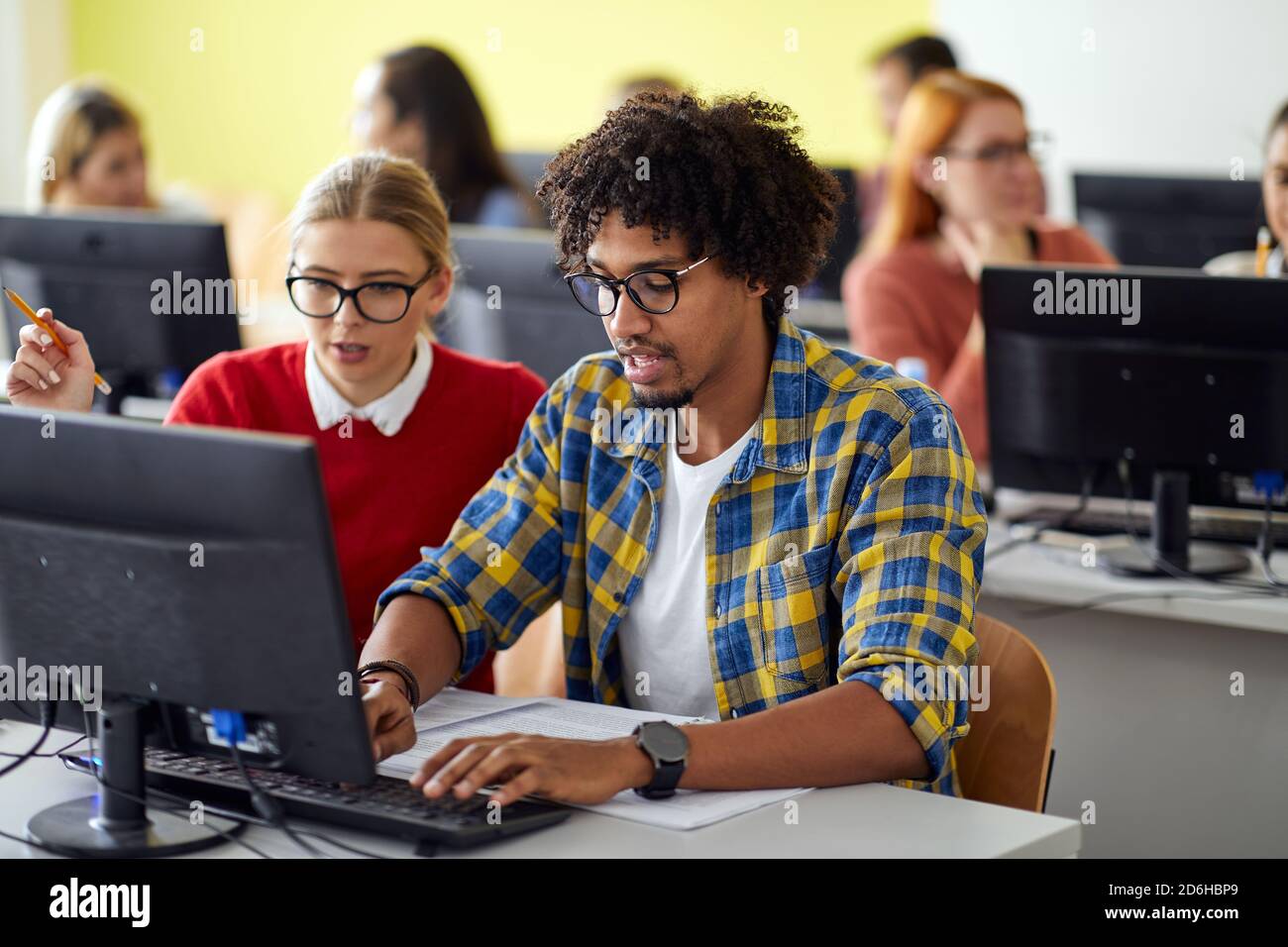 Students collaboration at the informatics lecture in the university ...