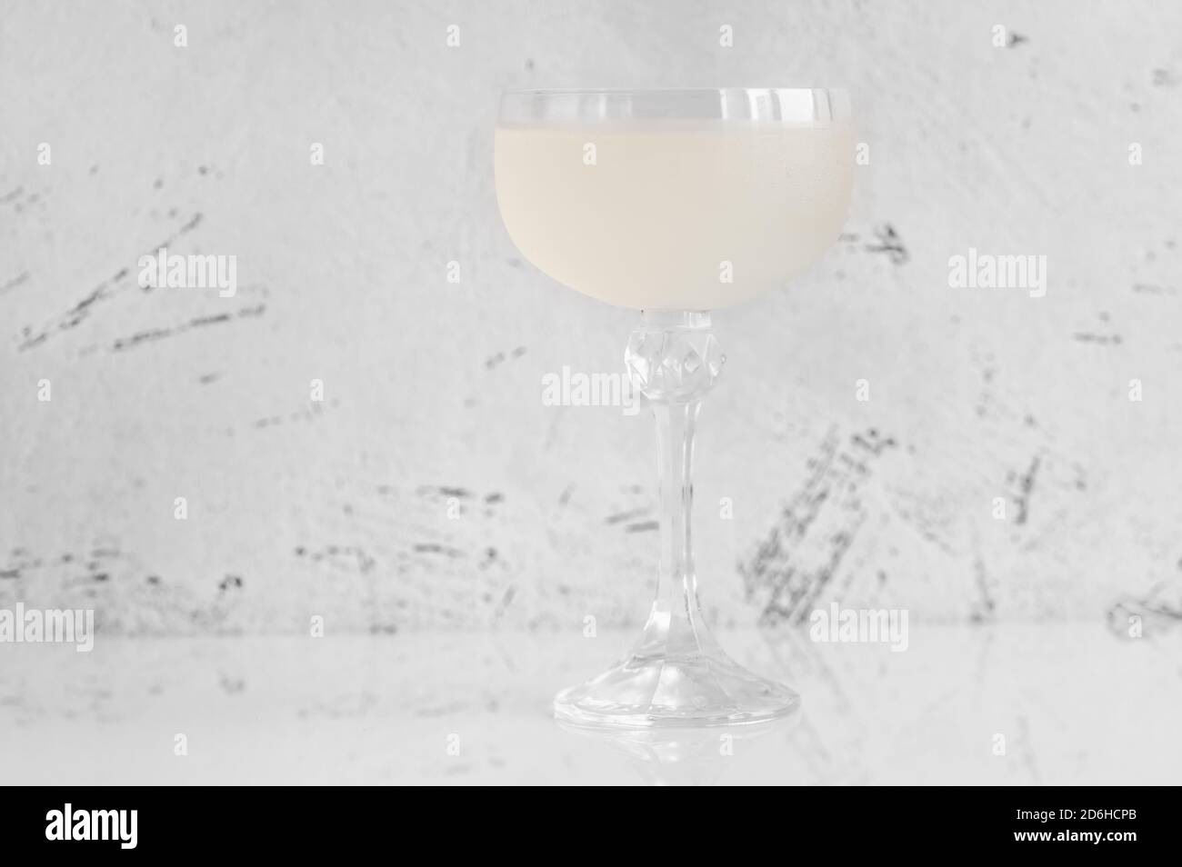 A glass of White Lady Cocktail on white background Stock Photo - Alamy
