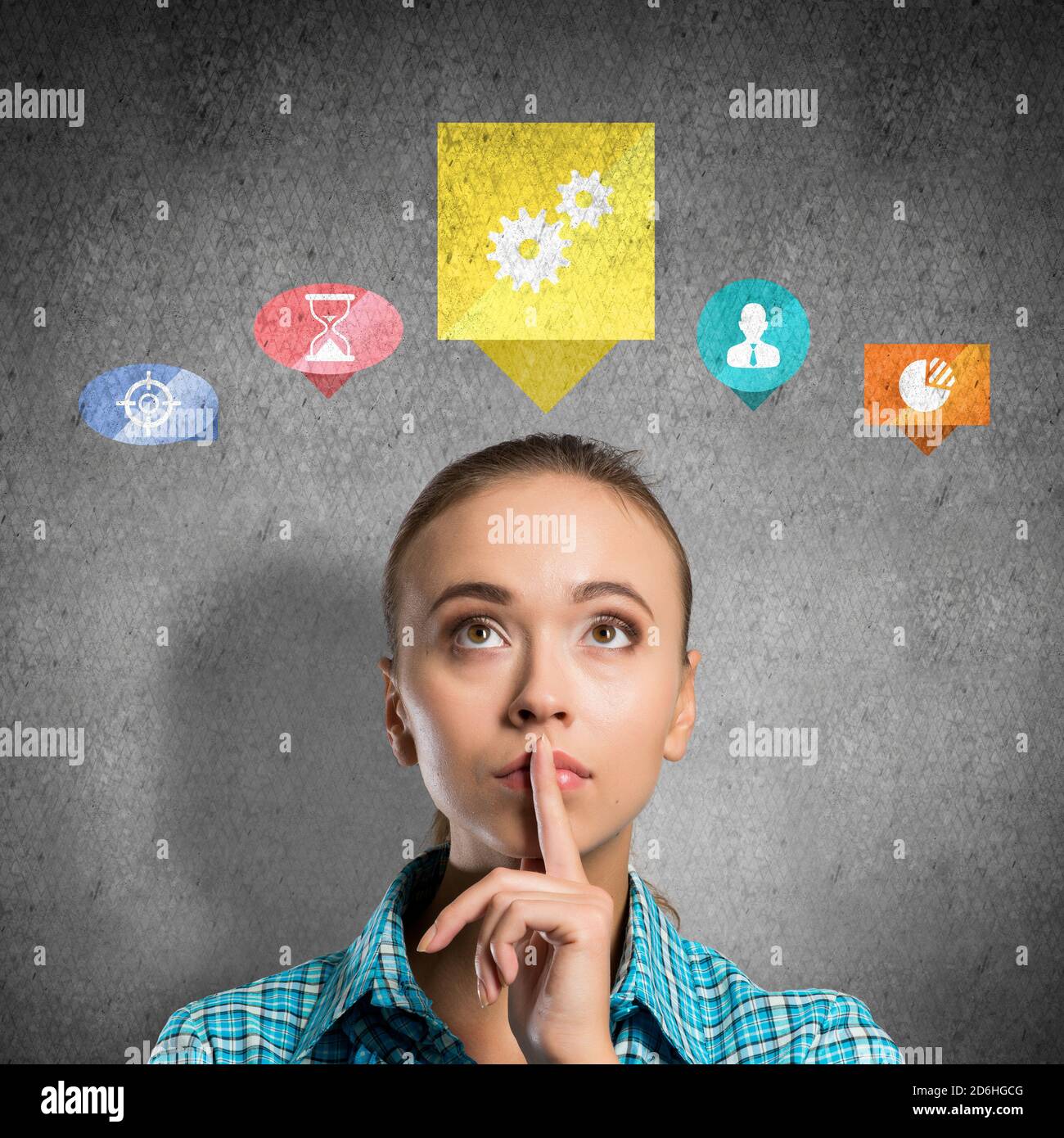 Girl showing hush gesture Stock Photo - Alamy