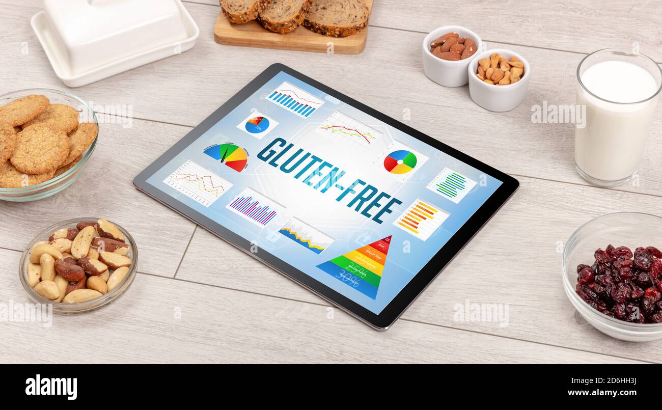 Organic food and tablet pc showing GLUTEN-FREE inscription, healthy ...