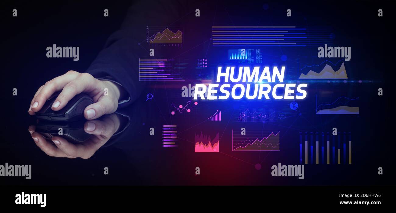 hand holding wireless peripheral with HUMAN RESOURCES inscription ...