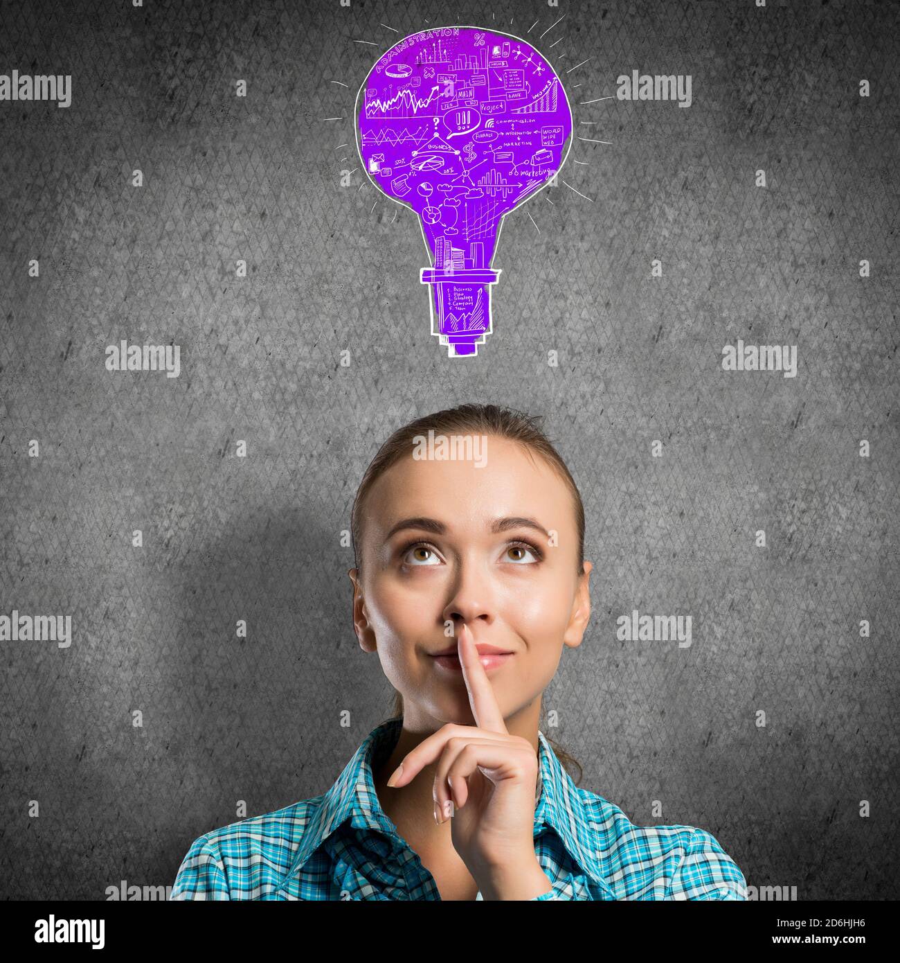 Girl showing hush gesture Stock Photo - Alamy
