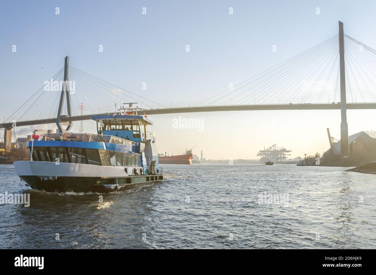 Harbor ferry and famous bridge (Köhlbrandbrücke) during scenic ...