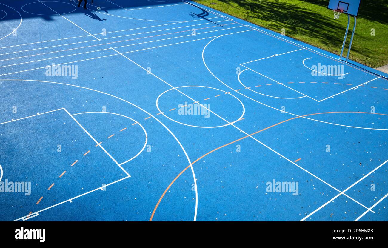 High angle view of backboard and basketball hoop shadow lined up with ...