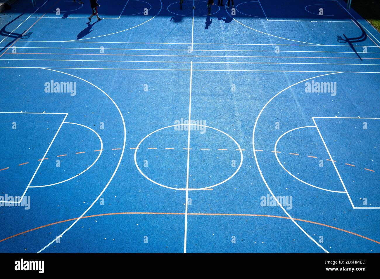 High angle view of backboard and basketball hoop shadow lined up with ...