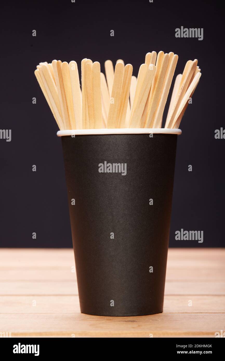 sticks for coffee inside to a paper cup Stock Photo - Alamy