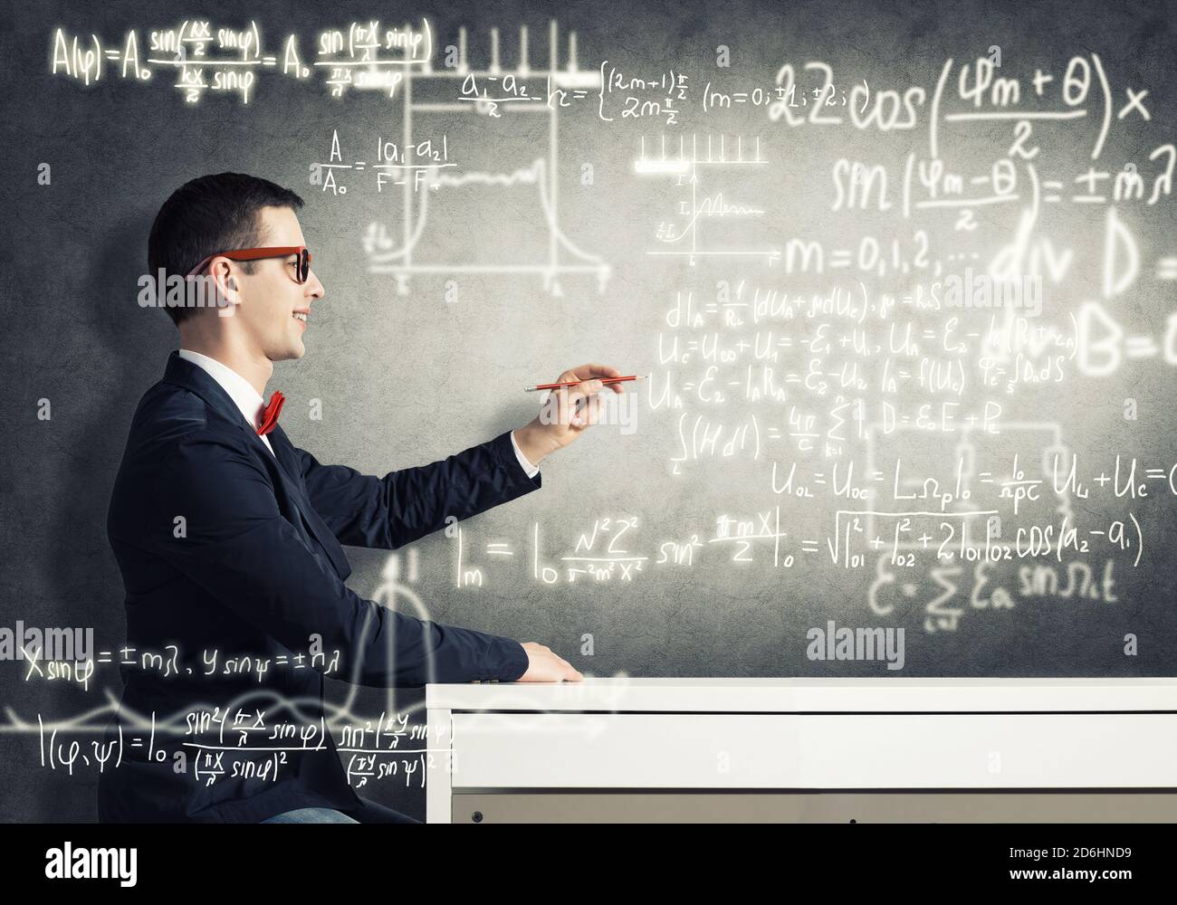 Student drawing science formulas Stock Photo - Alamy