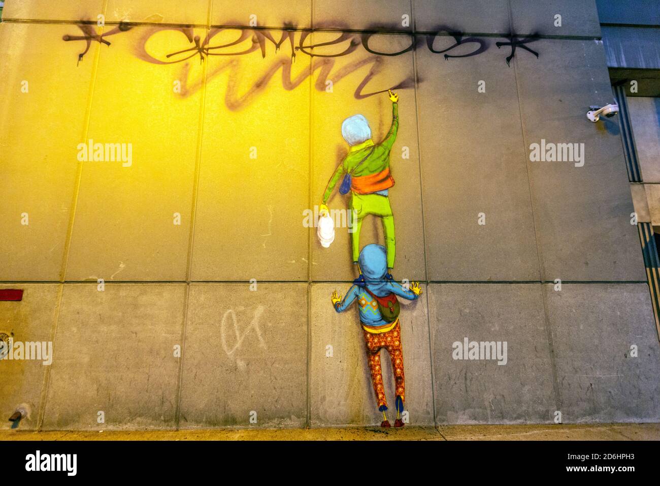 Graffiti of two gratifiers painting a graffiti, Boston, Massachusetts ...