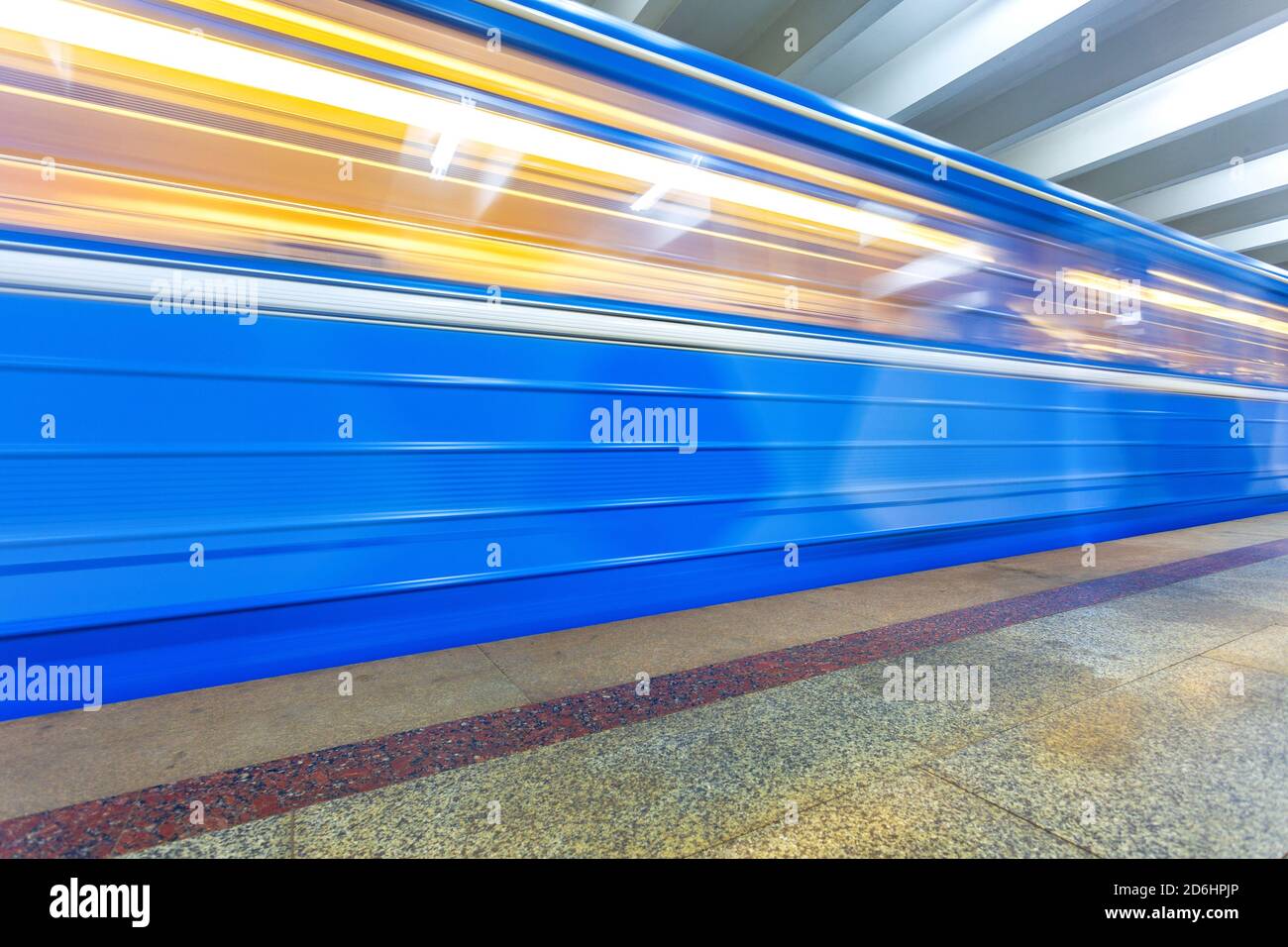 Blue subway train in motion at the underground station Stock Photo - Alamy