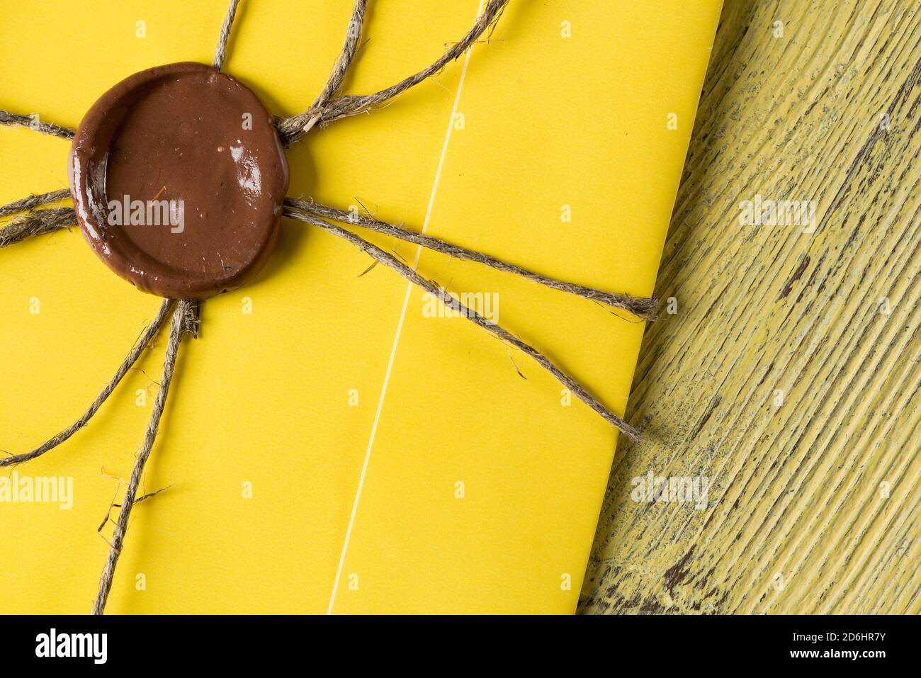 Letter with seal on table Stock Photo - Alamy