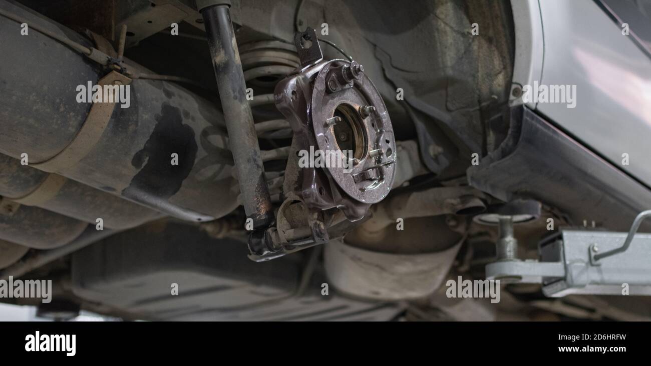 Car in service. Detail of the wheel hub assembly on automobile Stock ...