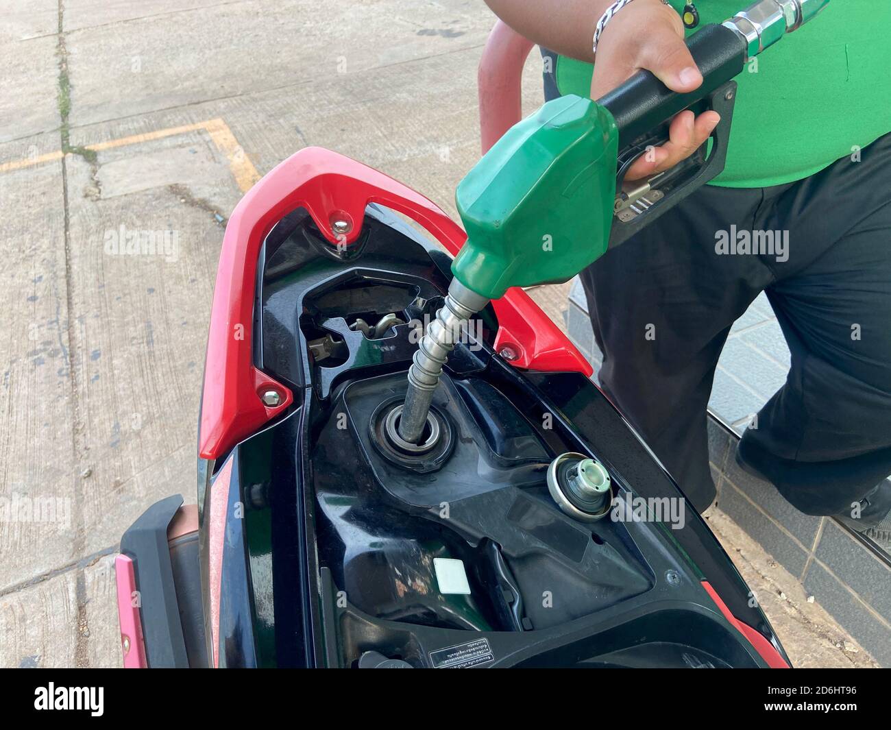 Filling motorcycle tank gas station hi-res stock photography and images ...