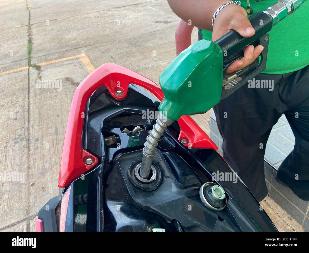 Filling motorcycle tank gas station hi-res stock photography and images ...