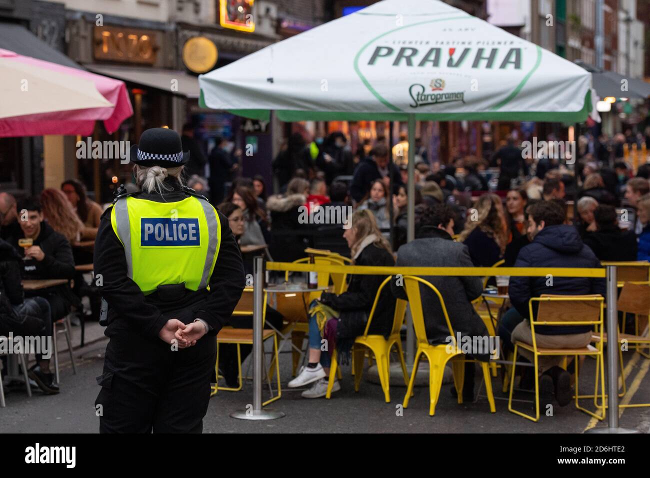 Police Monitor People Seated Outside Bars And Restaurants In Soho Hi