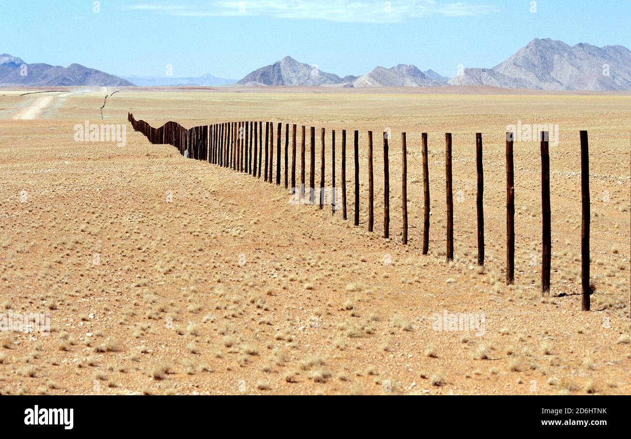 Wooden Posts in Desert, Namibia, Africa Stock Photo - Alamy