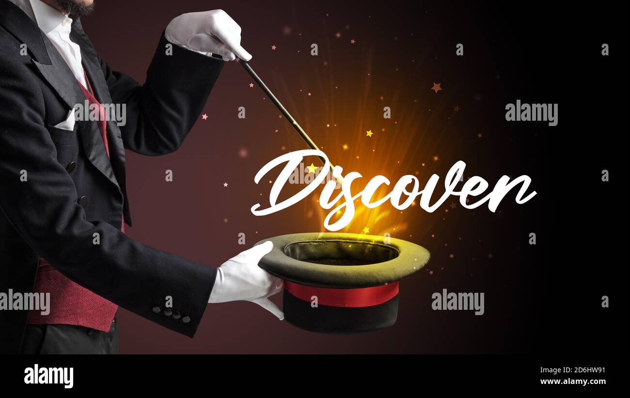 Magician is showing magic trick with Discover inscription, traveling ...