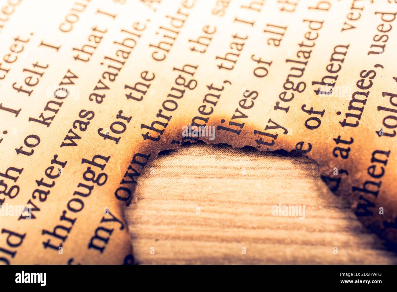 Closeup shot of the burning edge of a book page Stock Photo - Alamy