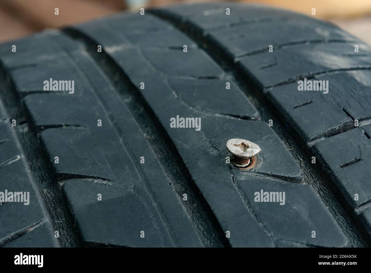 Tyre puncture nail in tyre hi-res stock photography and images - Alamy