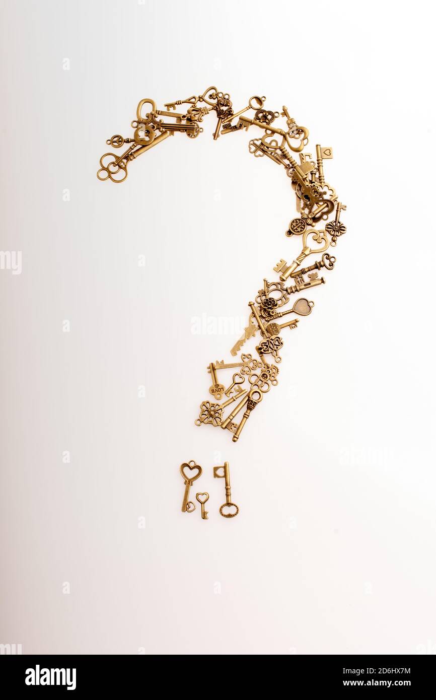 Vertical shot of vintage small keys in a question mark form Stock Photo ...