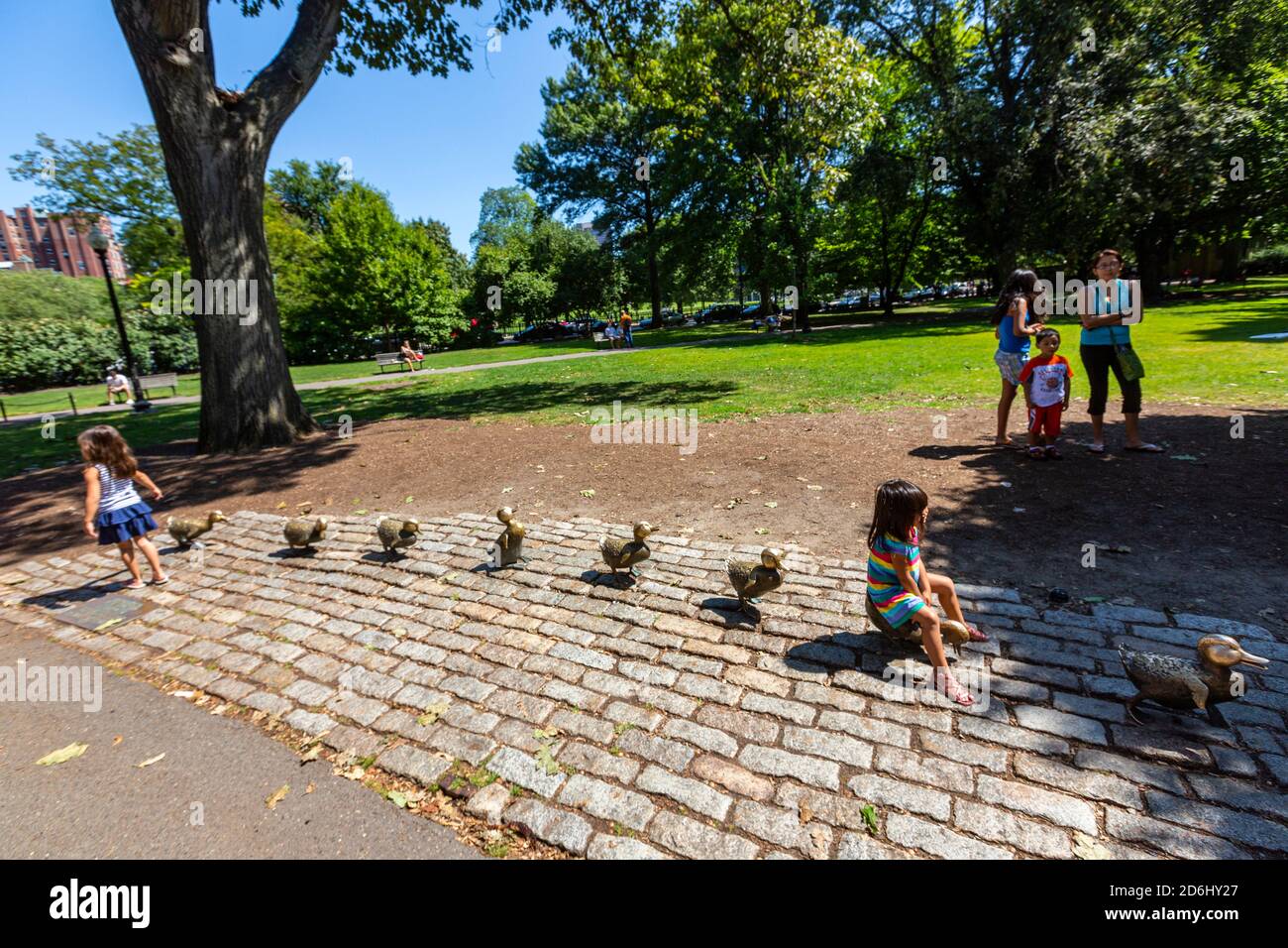 Children seated in bronze Make Way for Ducklings sculptures in Boston ...