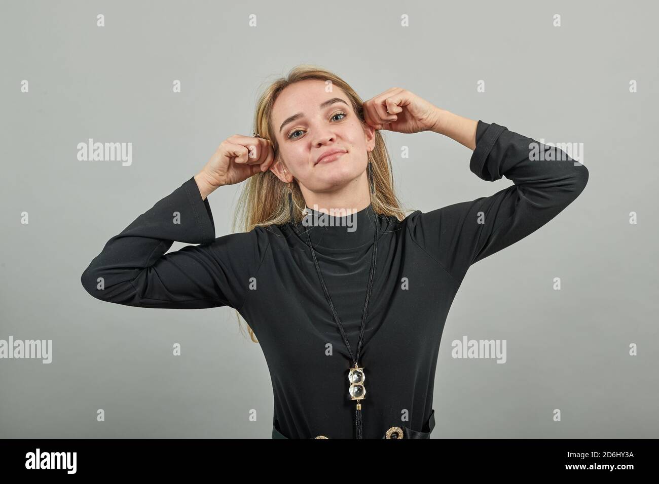 Pulling ear hi-res stock photography and images - Alamy